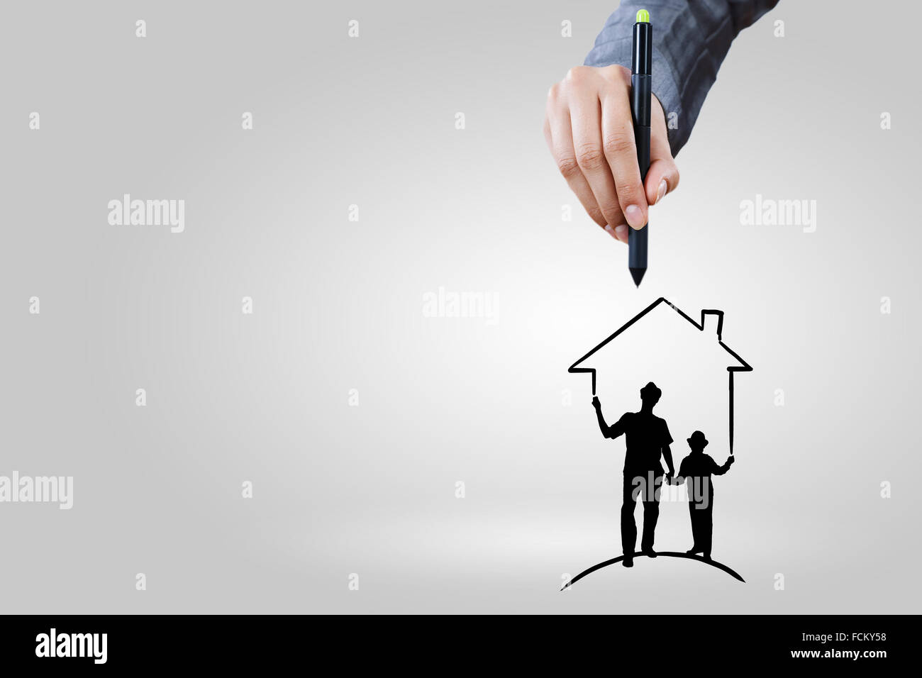 Close up of hand drawing sketches of happy family Stock Photo - Alamy
