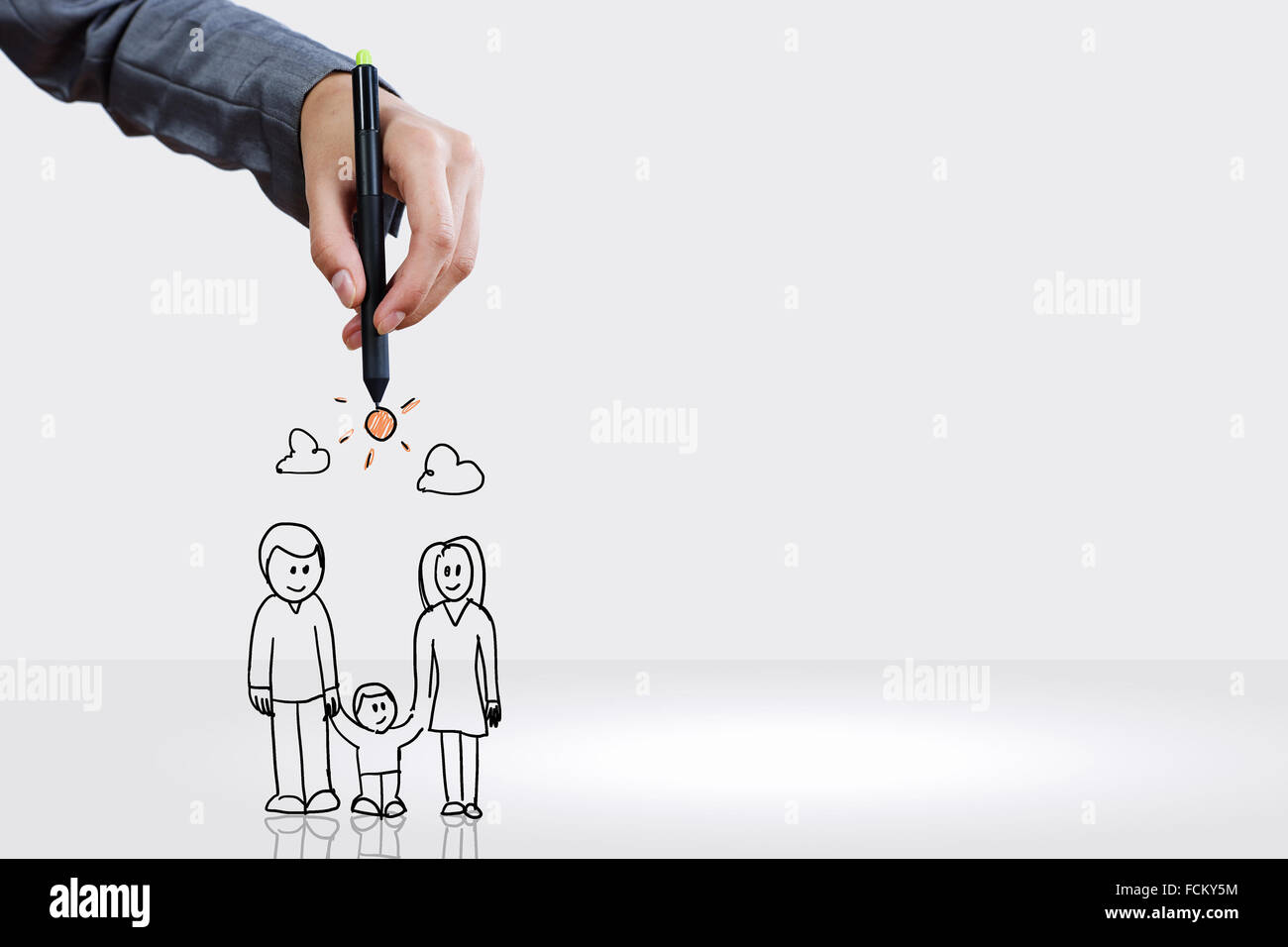 Close up of hand drawing sketches of happy family Stock Photo - Alamy