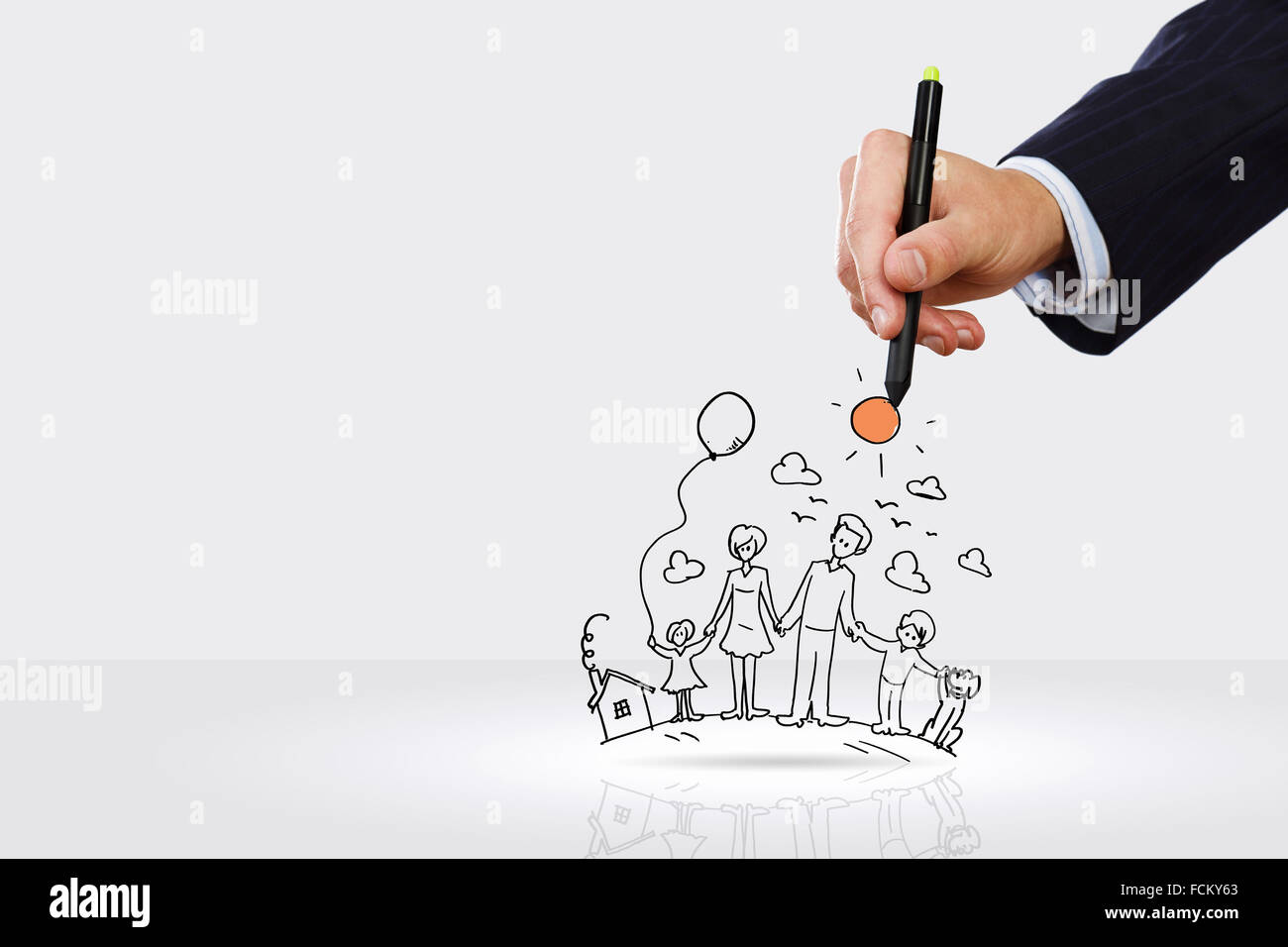 Close up of hand drawing sketches of happy family Stock Photo - Alamy