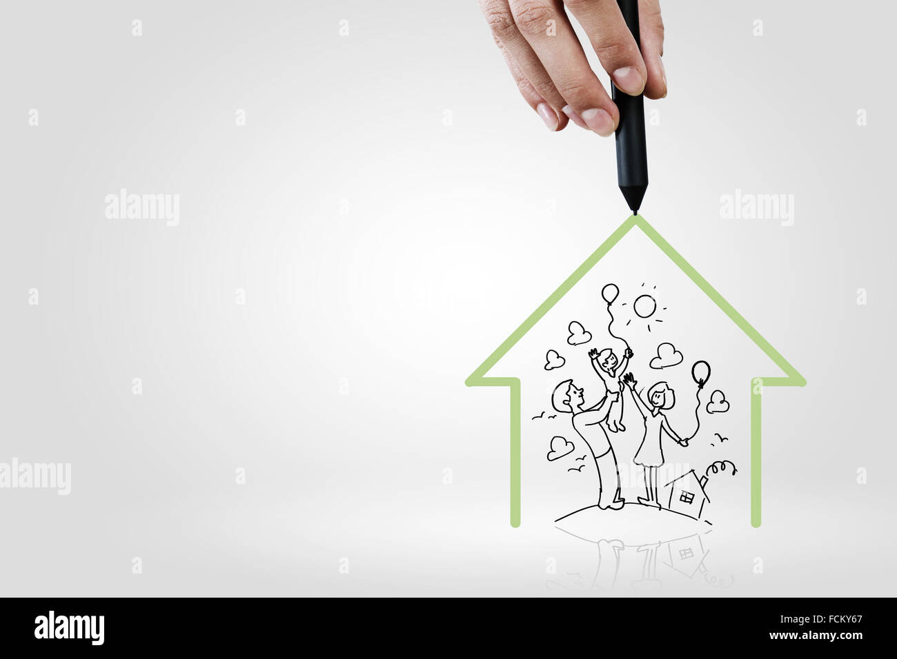 Close up of hand drawing sketches of happy family Stock Photo - Alamy