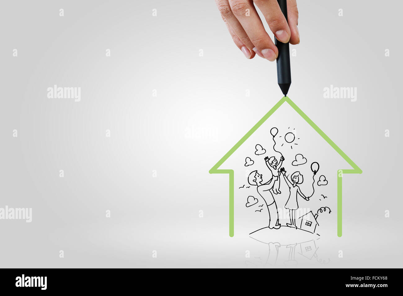 Close up of hand drawing sketches of happy family Stock Photo - Alamy