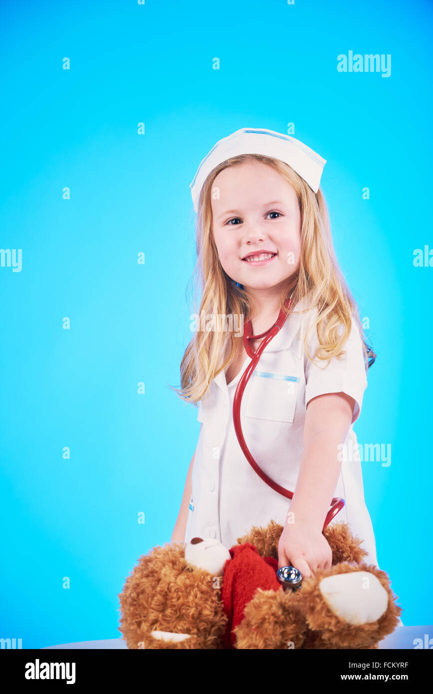 Nurse with teddy bear hi-res stock photography and images - Alamy