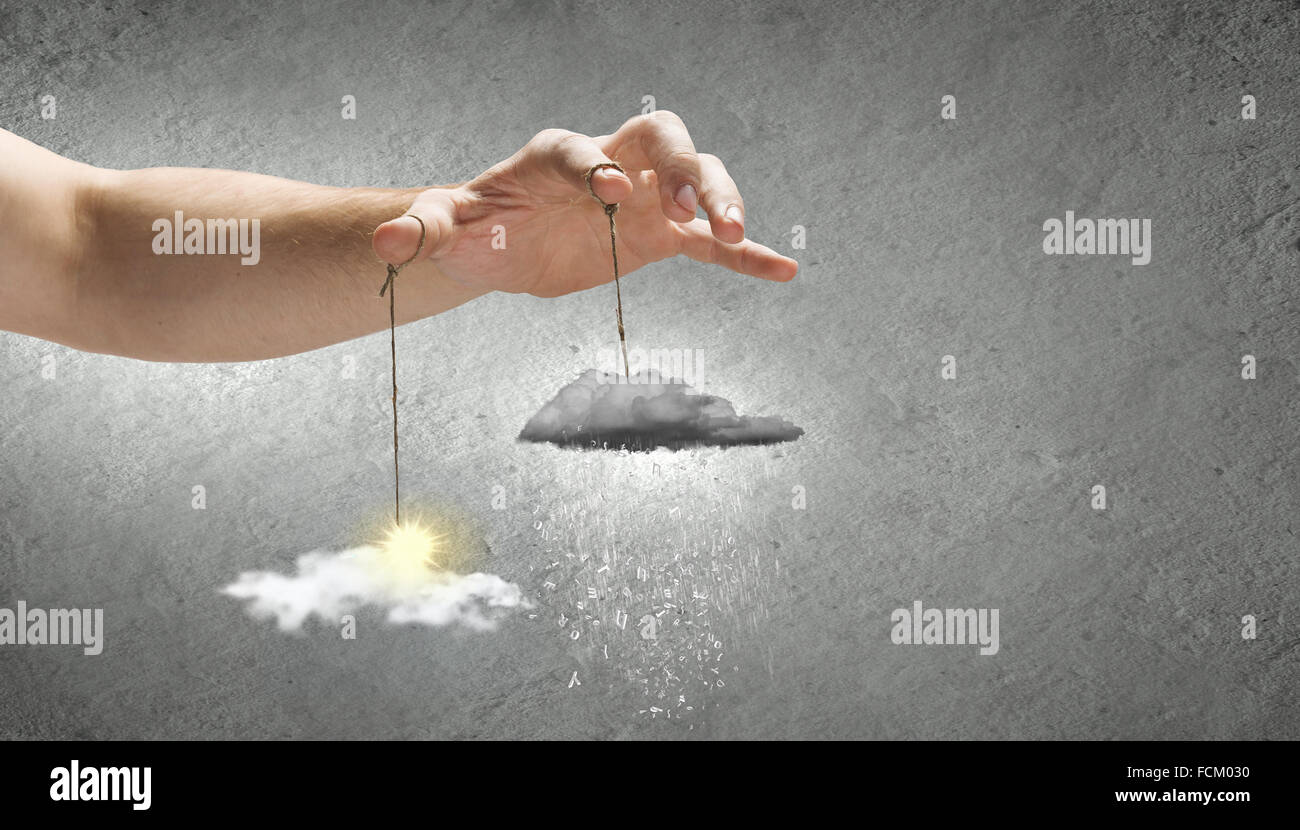 Close up of human hand and items hanging on fingers Stock Photo - Alamy