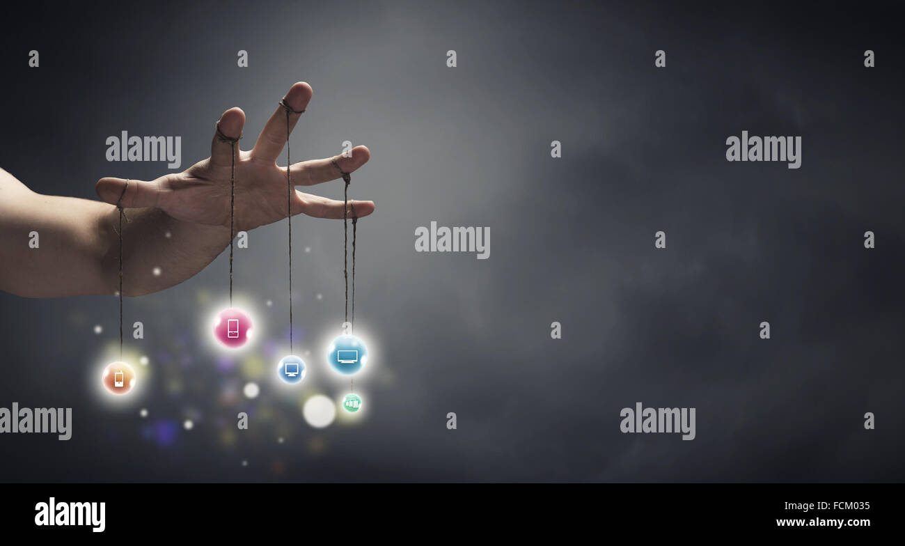 Close up of human hand and items hanging on fingers Stock Photo - Alamy