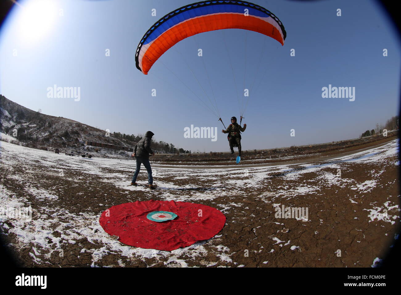 Xiangyang, China's Hubei Province. 23rd Jan, 2016. A paraglider fan ...