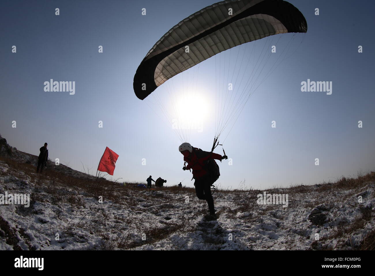 Xiangyang, China's Hubei Province. 23rd Jan, 2016. A paraglider fan ...
