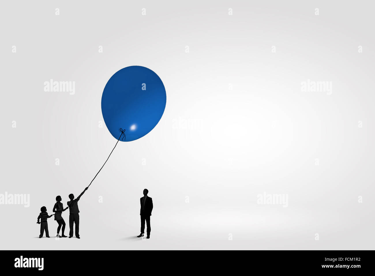 Little silhouettes of people pulling rope with balloon Stock Photo - Alamy