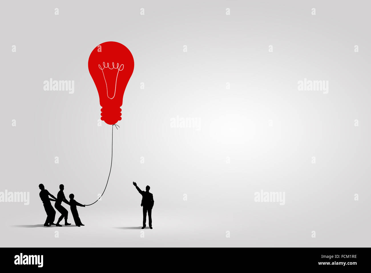 Little silhouettes of people pulling light bulb on rope Stock Photo - Alamy