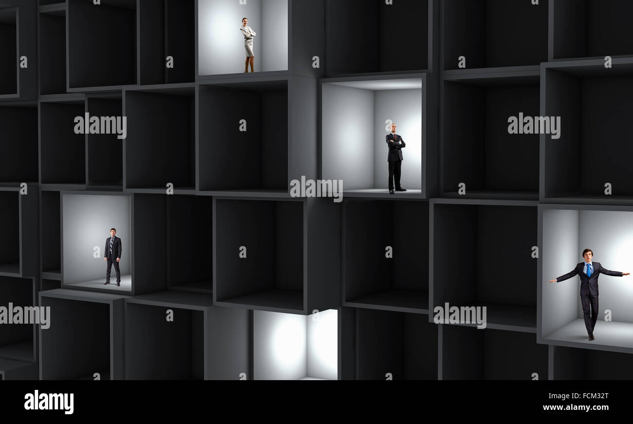 Miniatures of business people standing in cube Stock Photo - Alamy