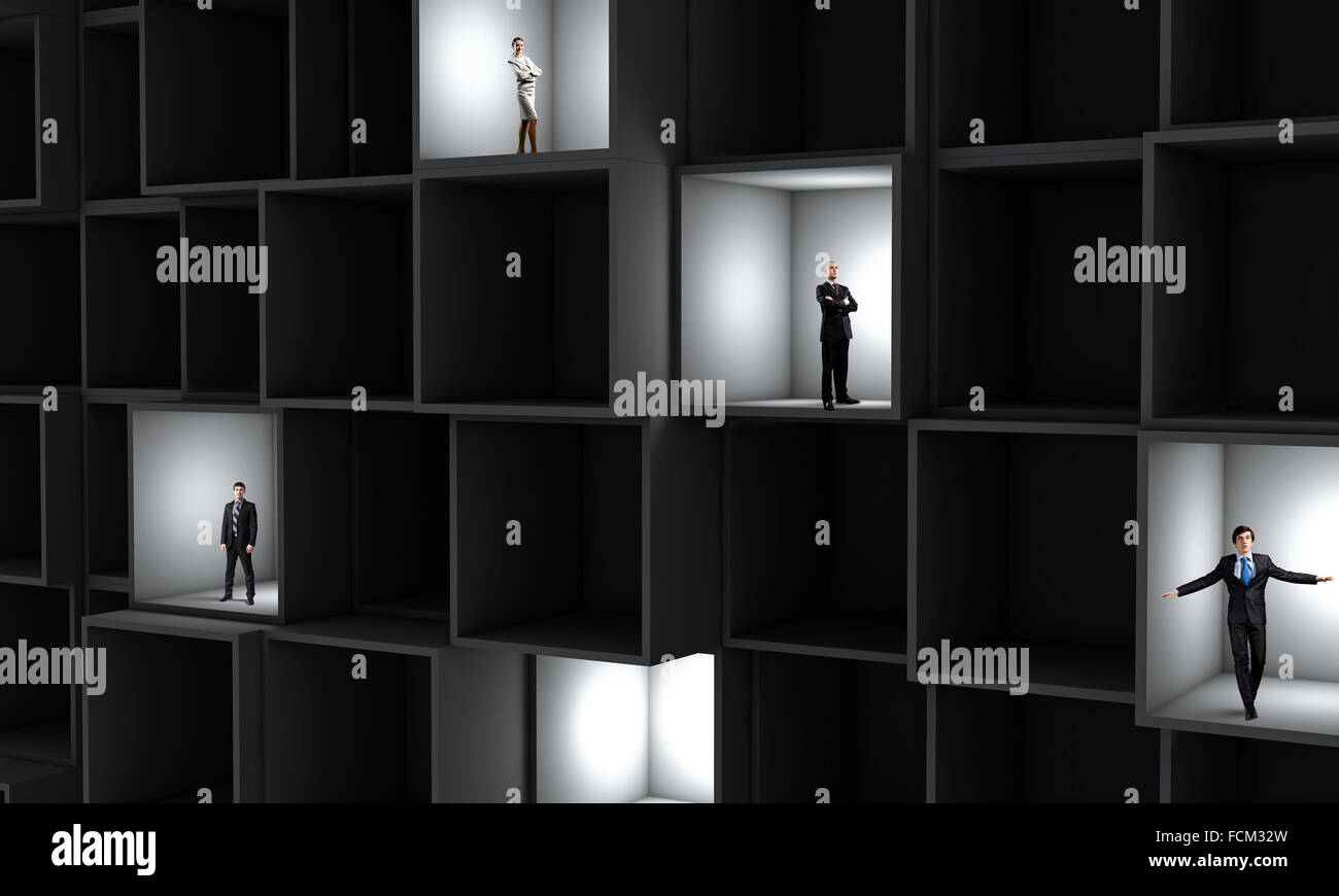 Miniatures of business people standing in cube Stock Photo - Alamy