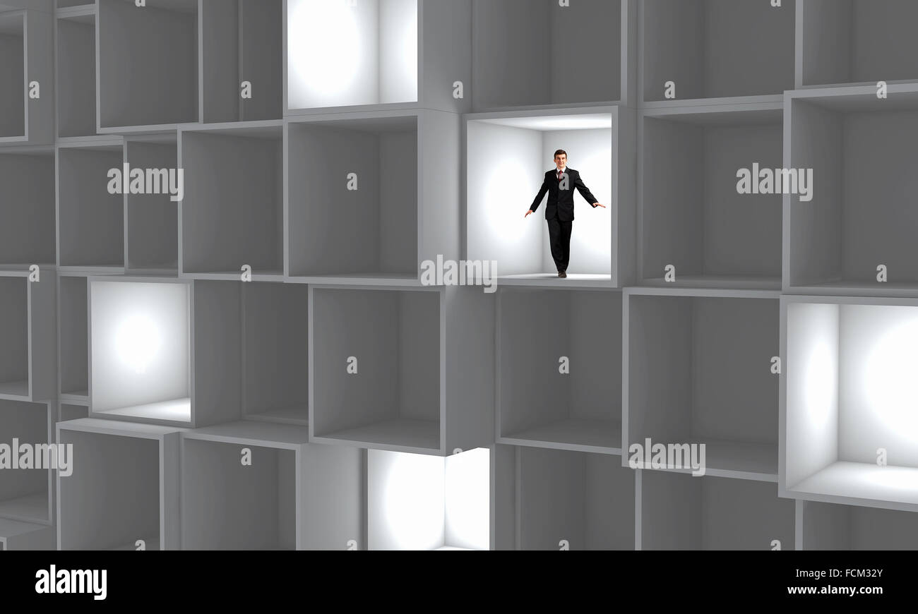 Miniature of businessman walking in white cube Stock Photo - Alamy