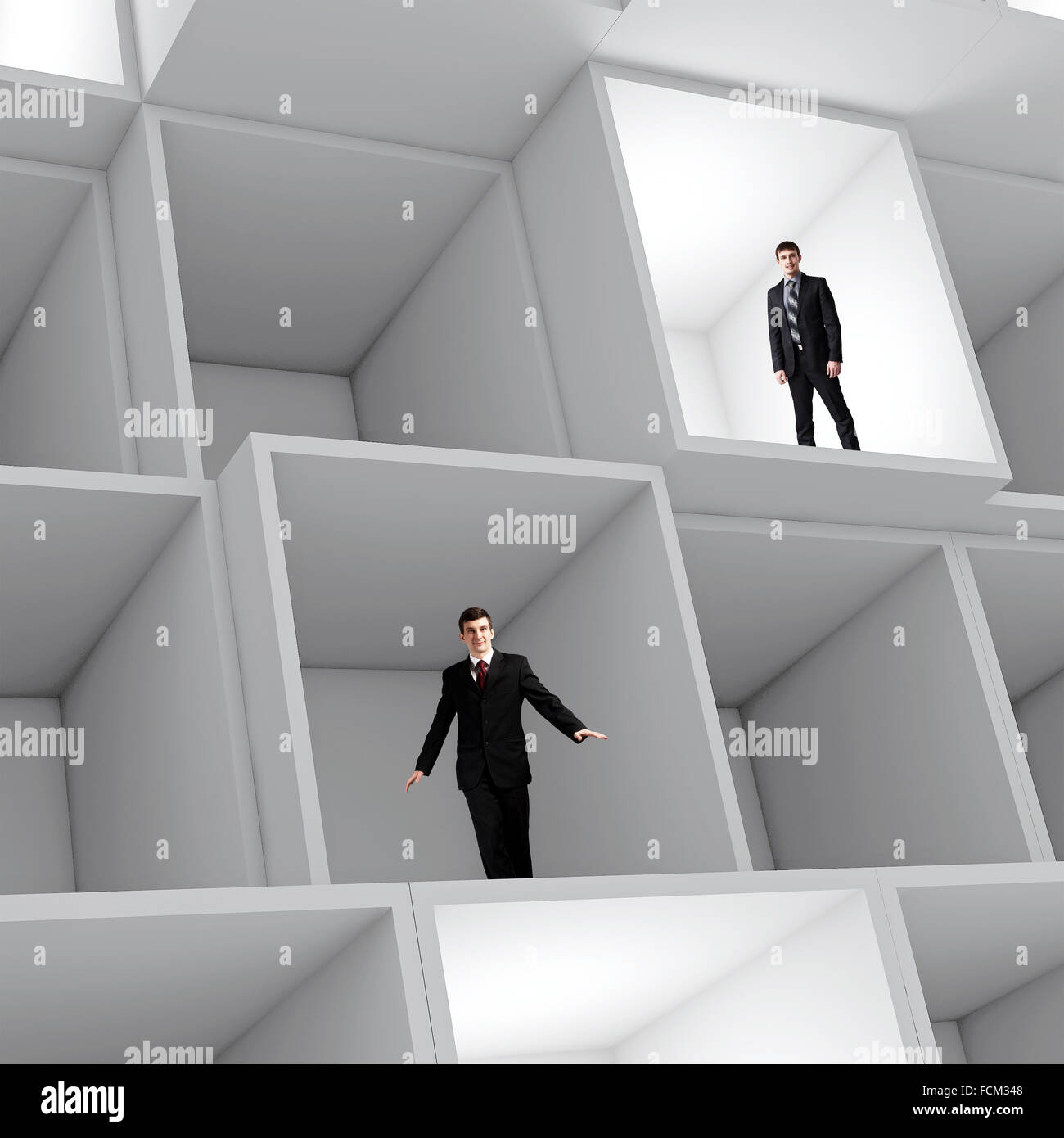 Miniatures of business people standing in cube Stock Photo - Alamy