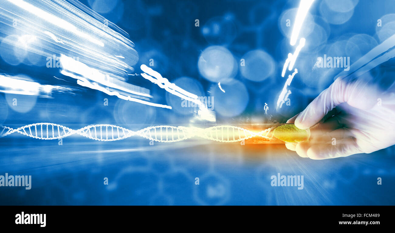 Close up of scientist hand holding tube with leaf Stock Photo - Alamy