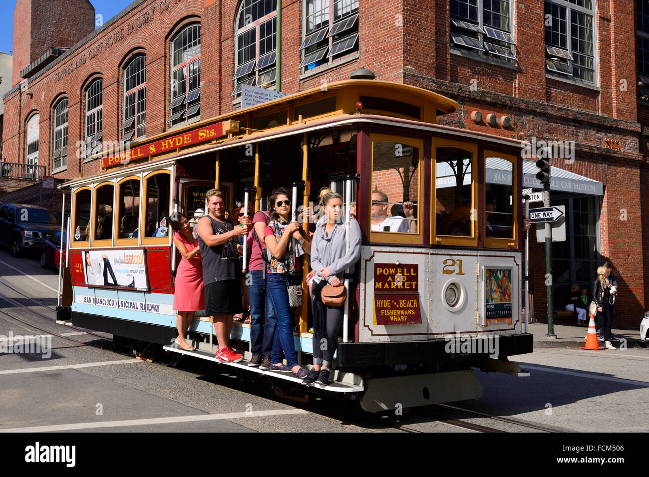 Powell & Hyde cable car passing front of Cable Car Museum in Nob Hill ...