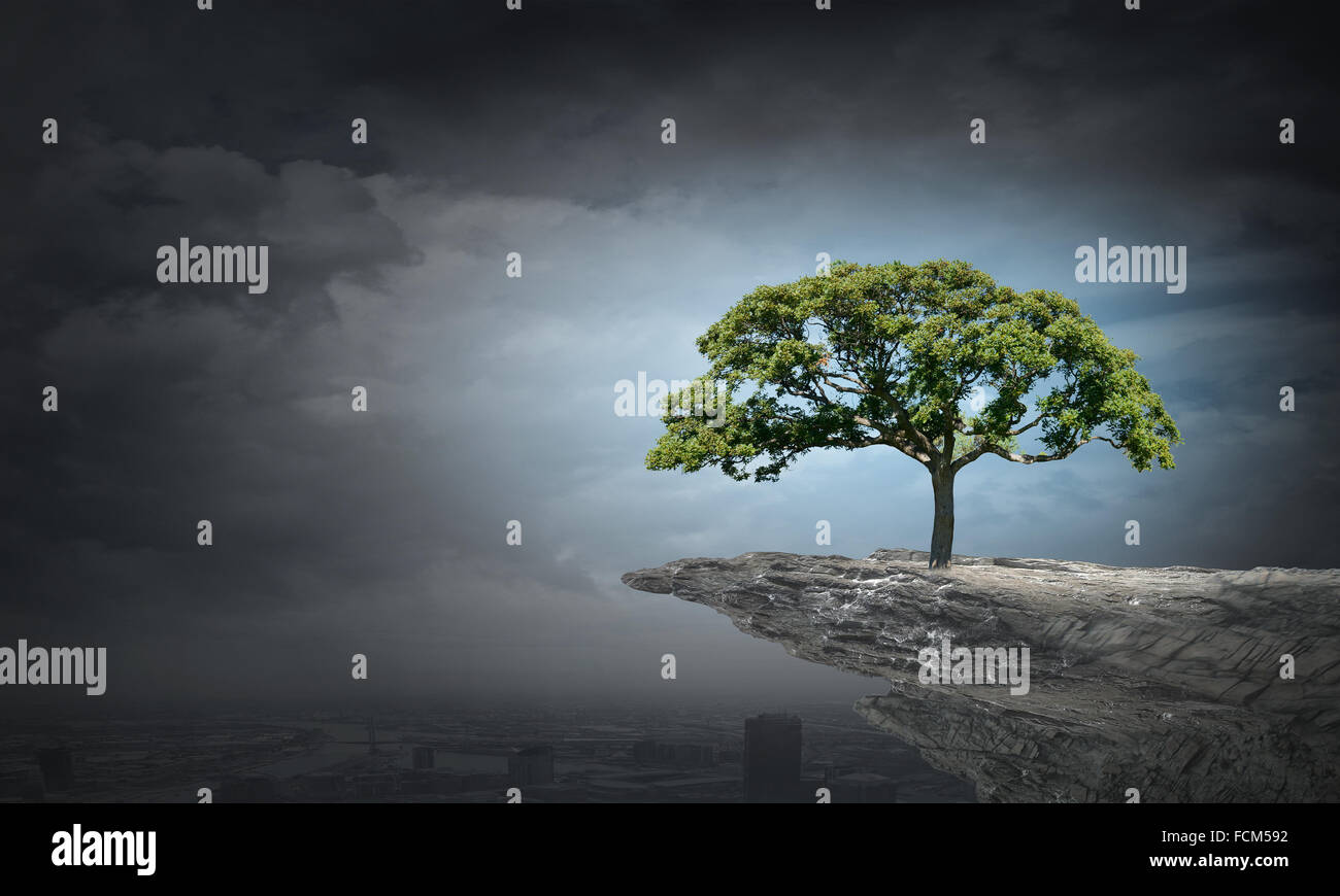 Green tree as a symbol of environmental protection Stock Photo - Alamy