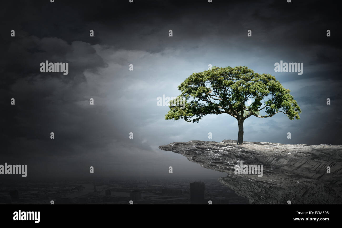 Green tree as a symbol of environmental protection Stock Photo - Alamy