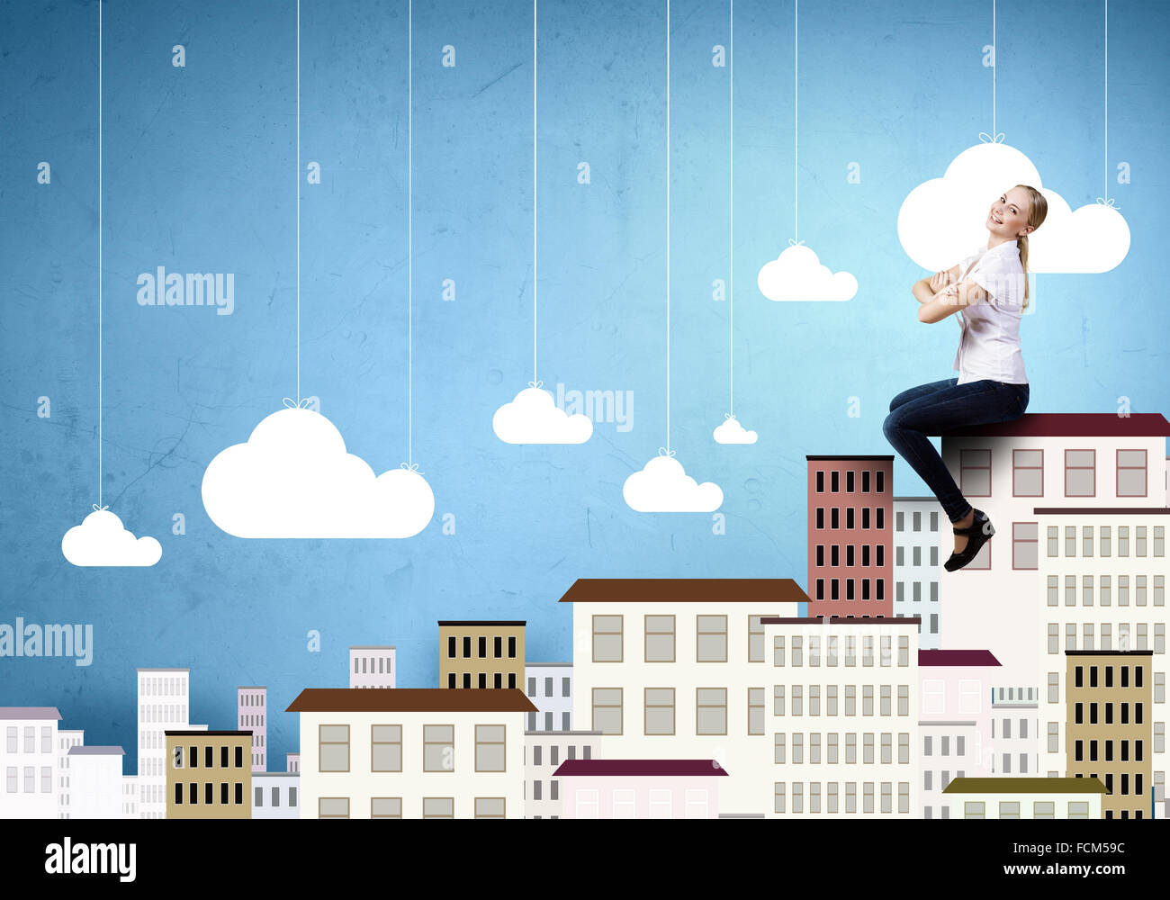 Young pretty girl sitting on building roof Stock Photo - Alamy