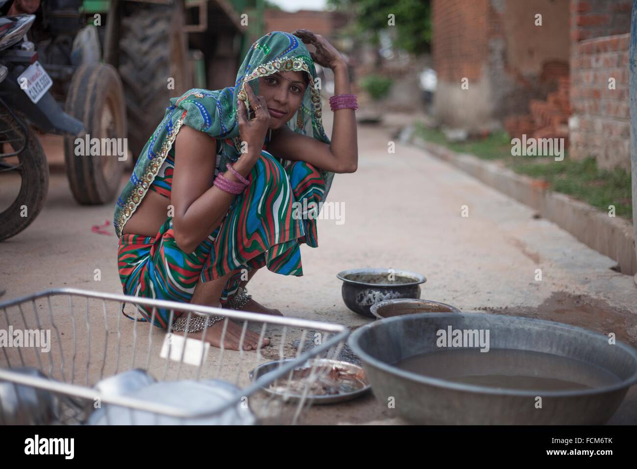 Indian teenager in slum hi-res stock photography and images - Alamy