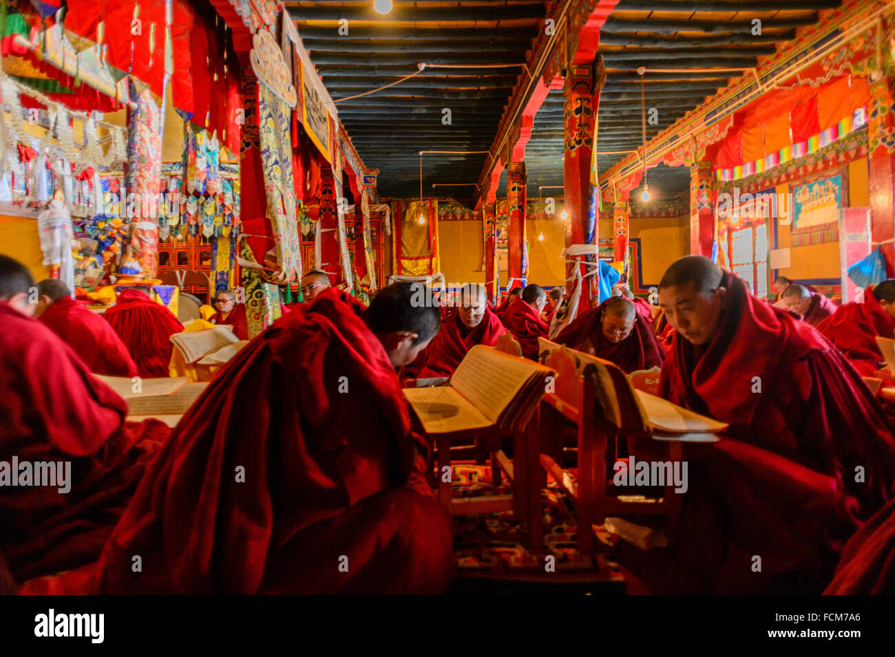 Praying at the temple Stock Photo - Alamy