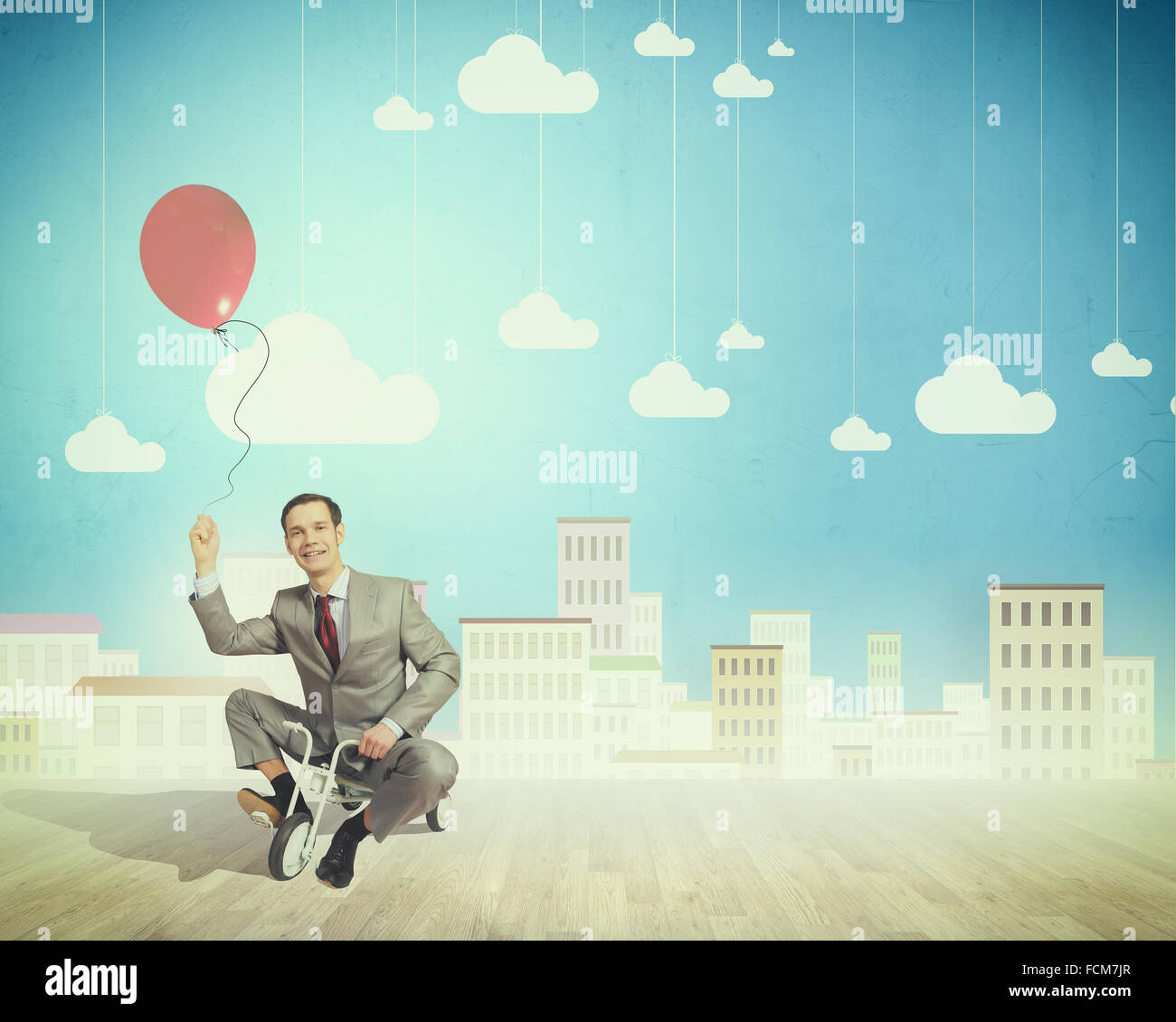 Young handsome businessman riding three wheeled bicycle Stock Photo - Alamy