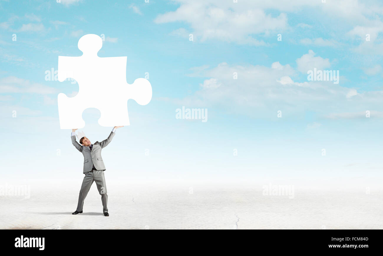 Young handsome businessman wearing white paper crown Stock Photo - Alamy