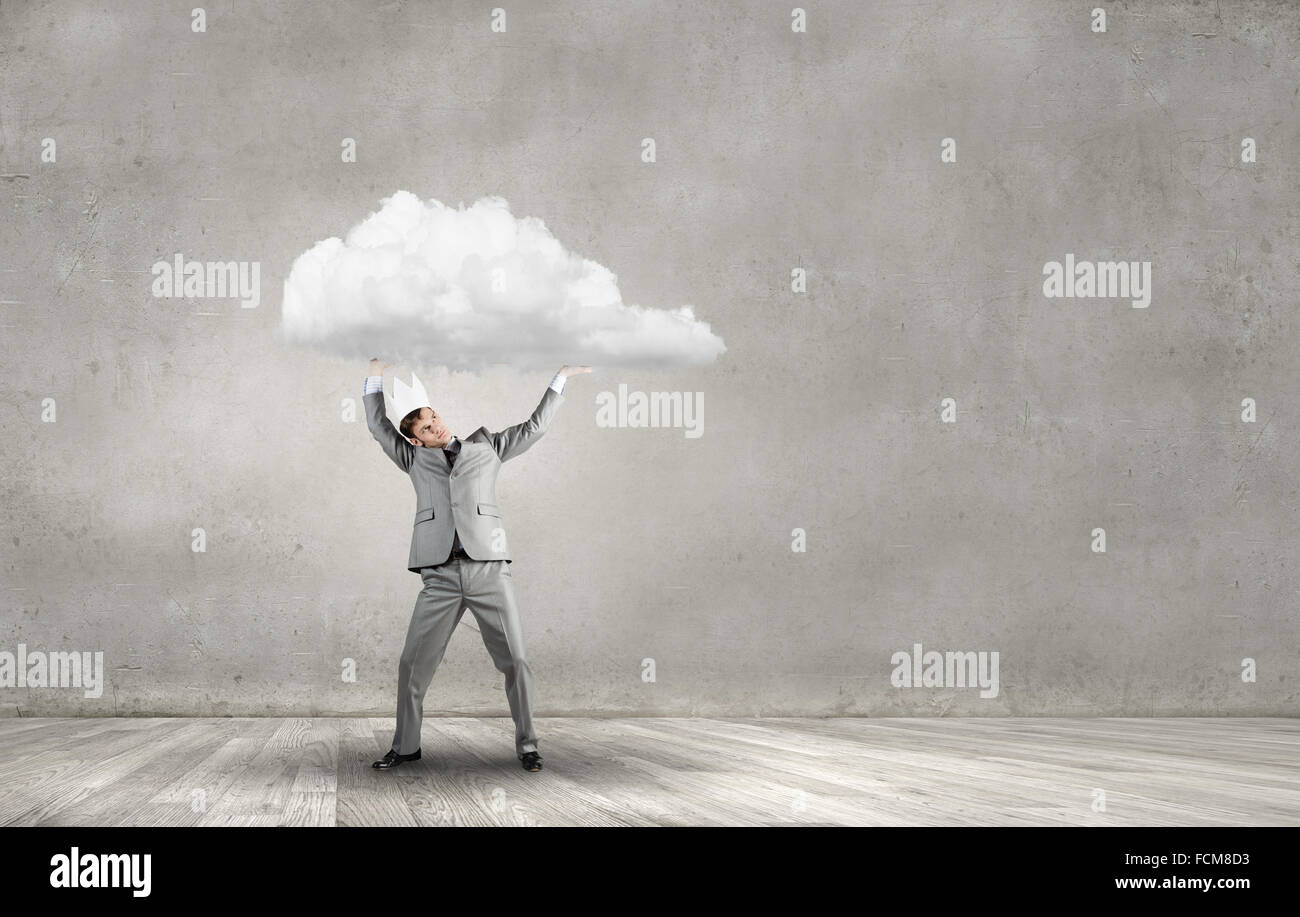 Young handsome businessman wearing white paper crown Stock Photo - Alamy