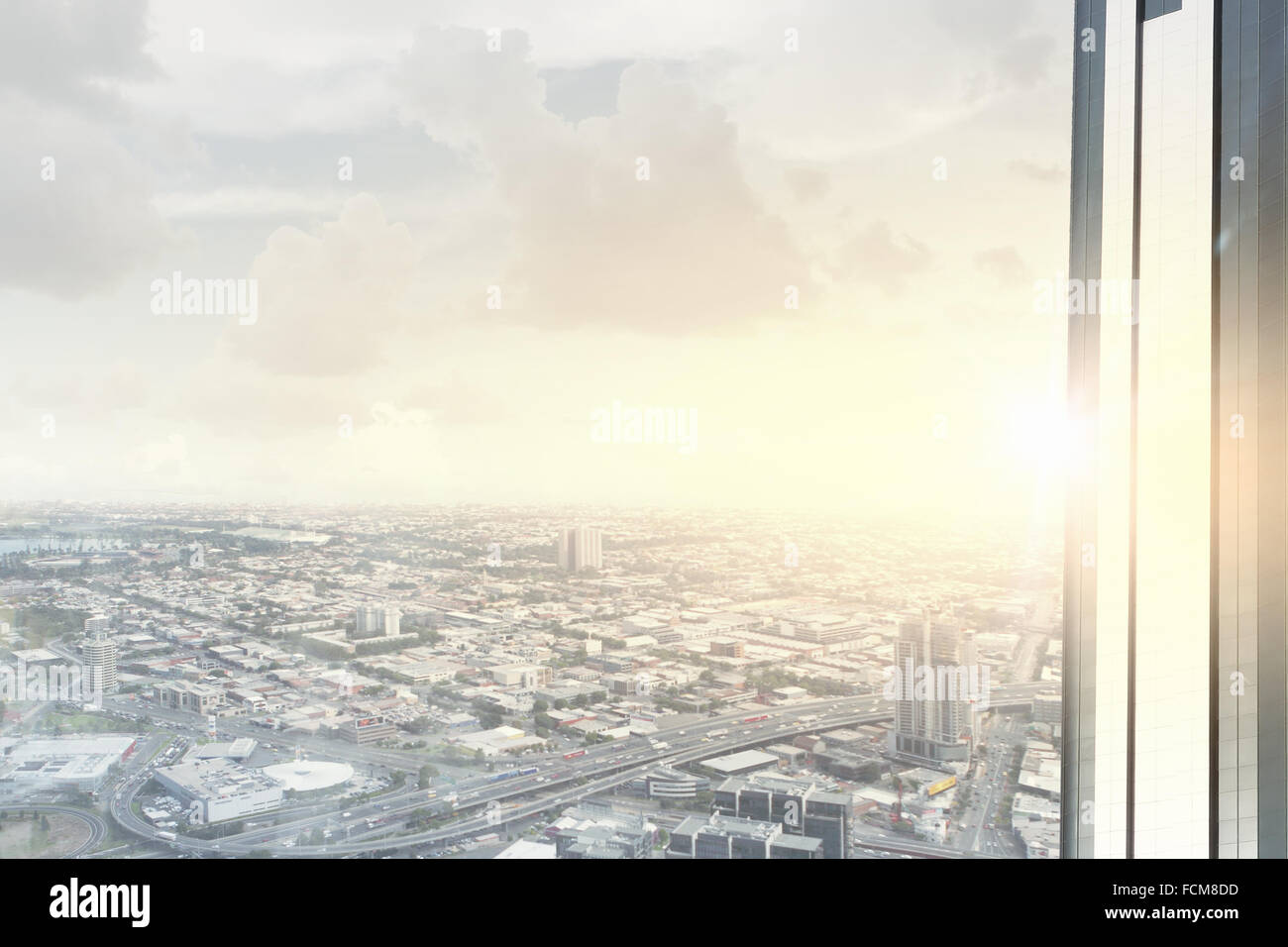 Top view of modern city in lights of sunset Stock Photo - Alamy