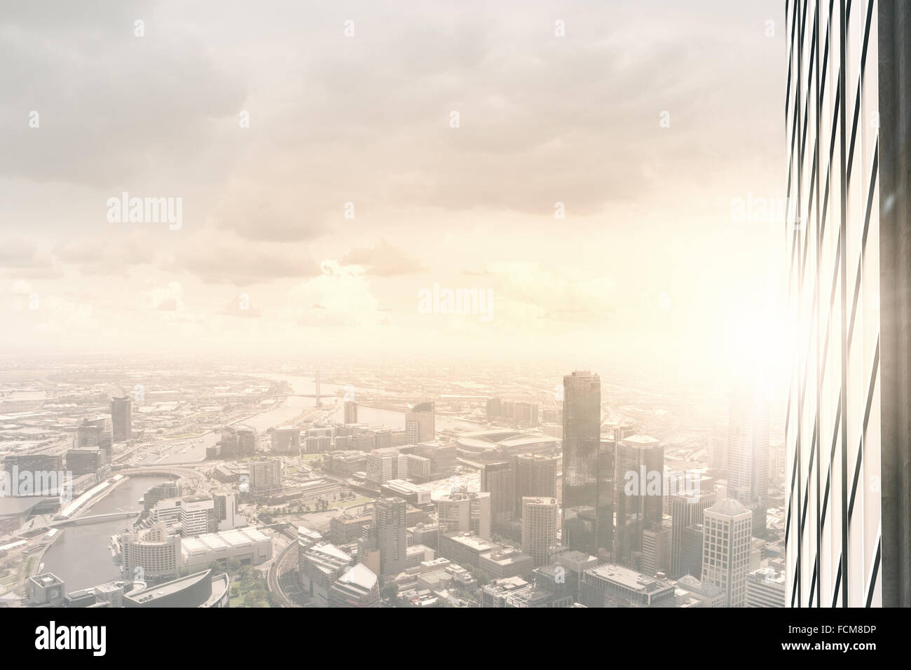 Top view of modern city in lights of sunset Stock Photo - Alamy