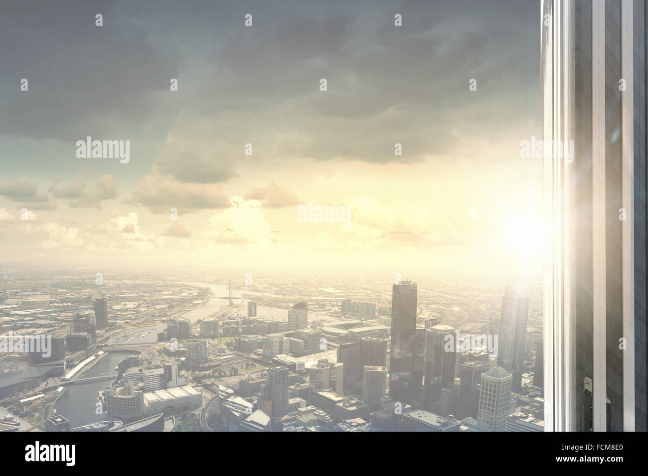 Top view of modern city in lights of sunset Stock Photo - Alamy