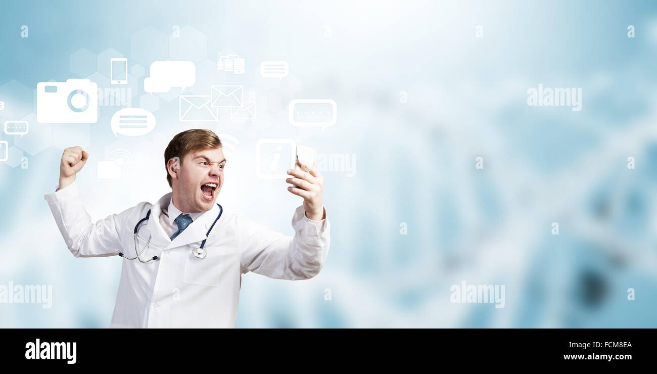 Angry doctor phone hi-res stock photography and images - Alamy