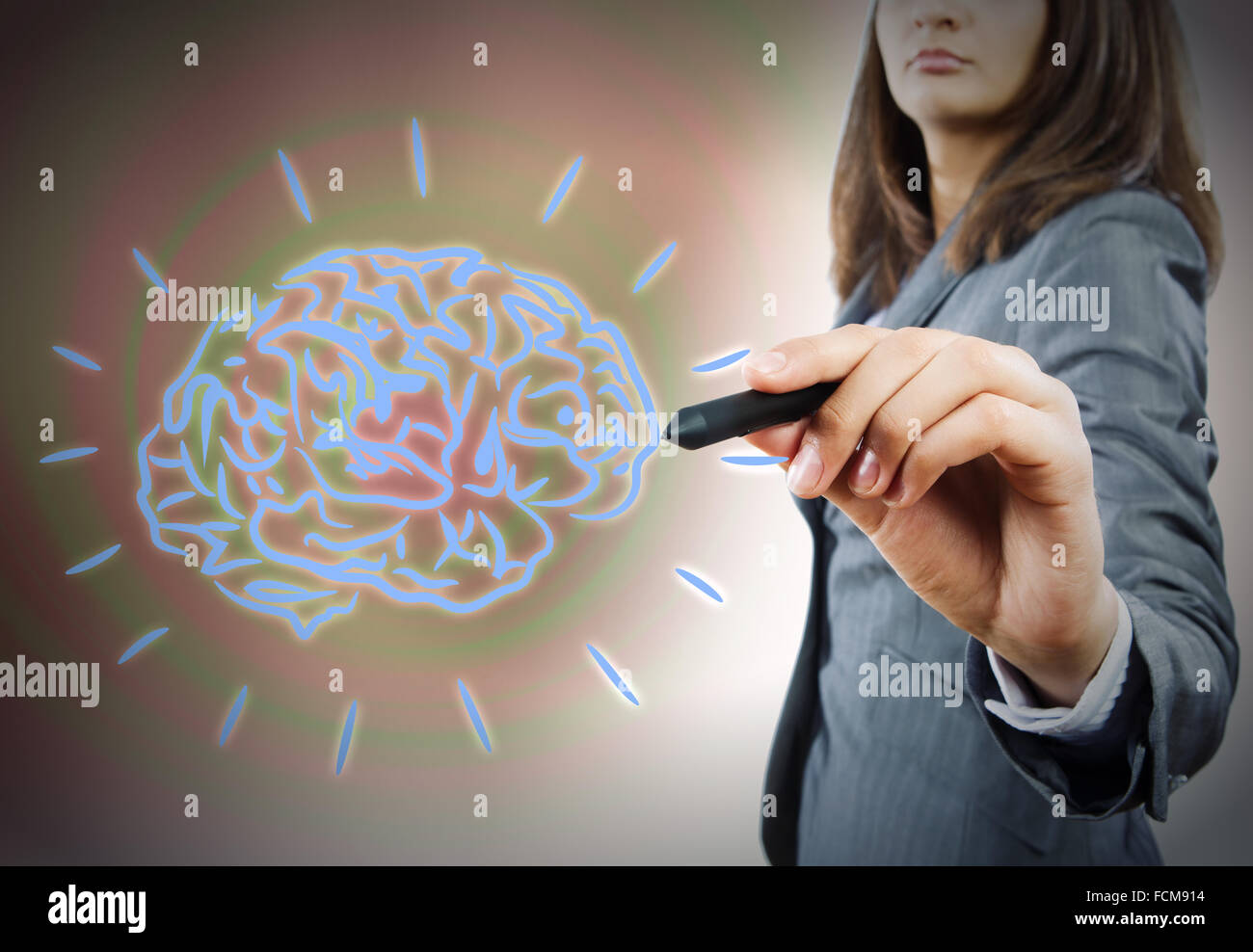 Close up of businesswoman drawing human brain with pen Stock Photo - Alamy