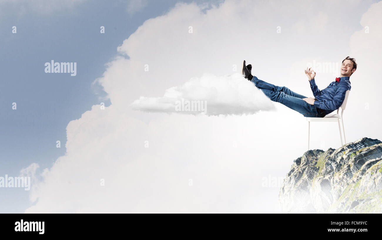 Man leg up chair hi-res stock photography and images - Alamy