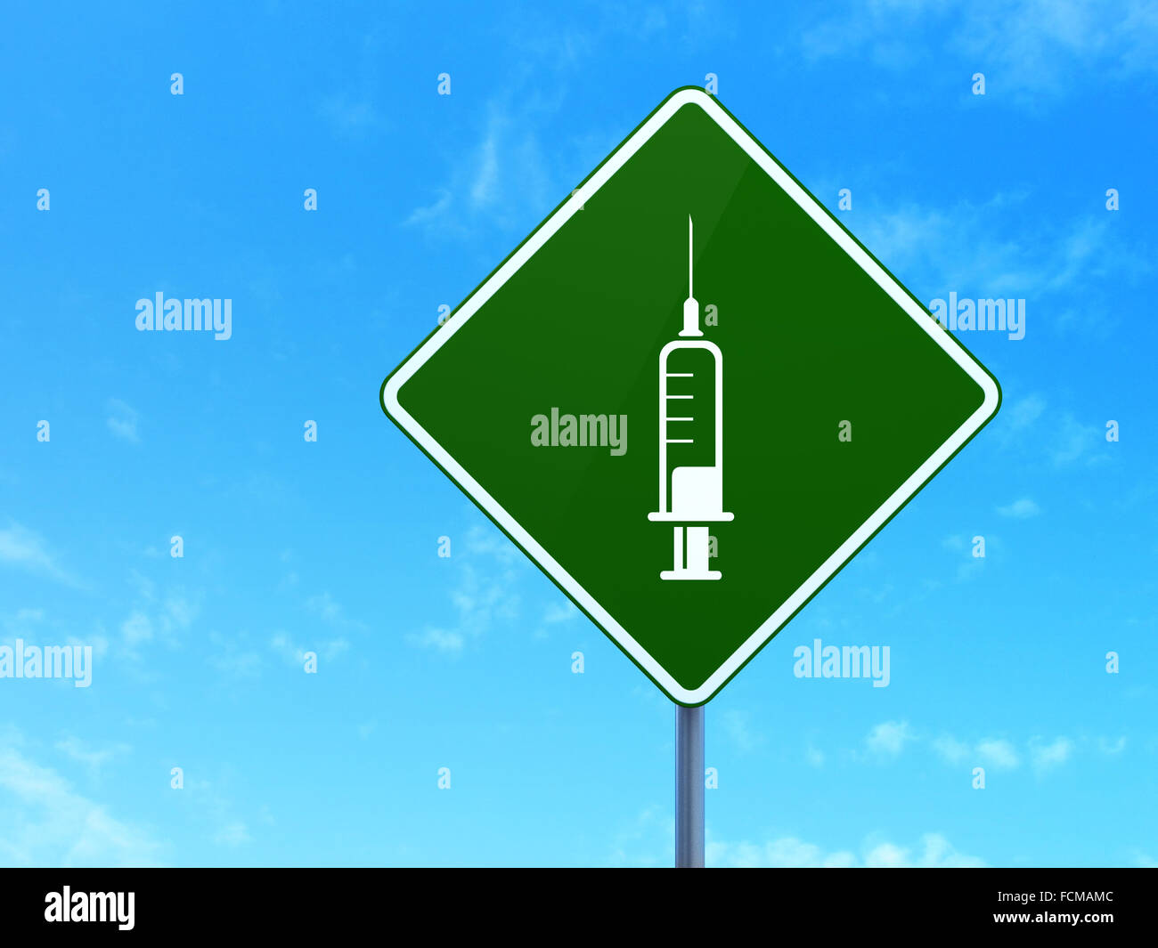 Healthcare concept: Syringe on road sign background Stock Photo - Alamy
