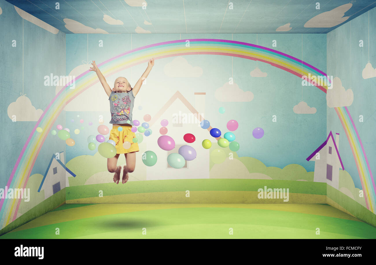 Little cute girl jumping high among balloons flying in sky Stock Photo ...