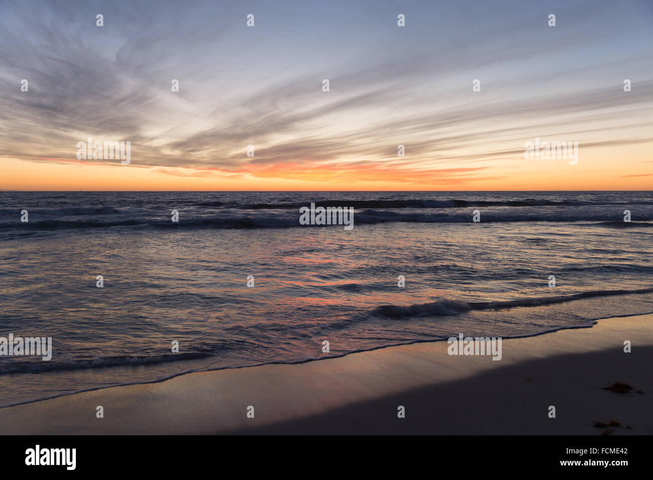 Beautiful landscaped image of sunset over sea Stock Photo - Alamy