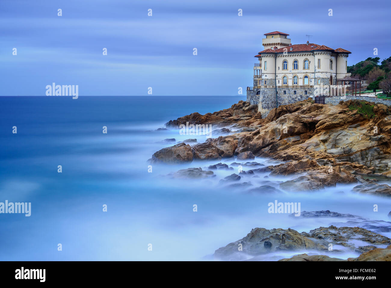 Boccale castle landmark on cliff rock and sea in winter. Tuscany, Italy ...