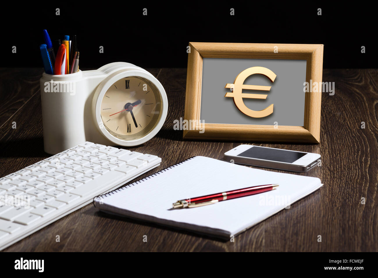 Close up of workplace with office supplies on table Stock Photo - Alamy