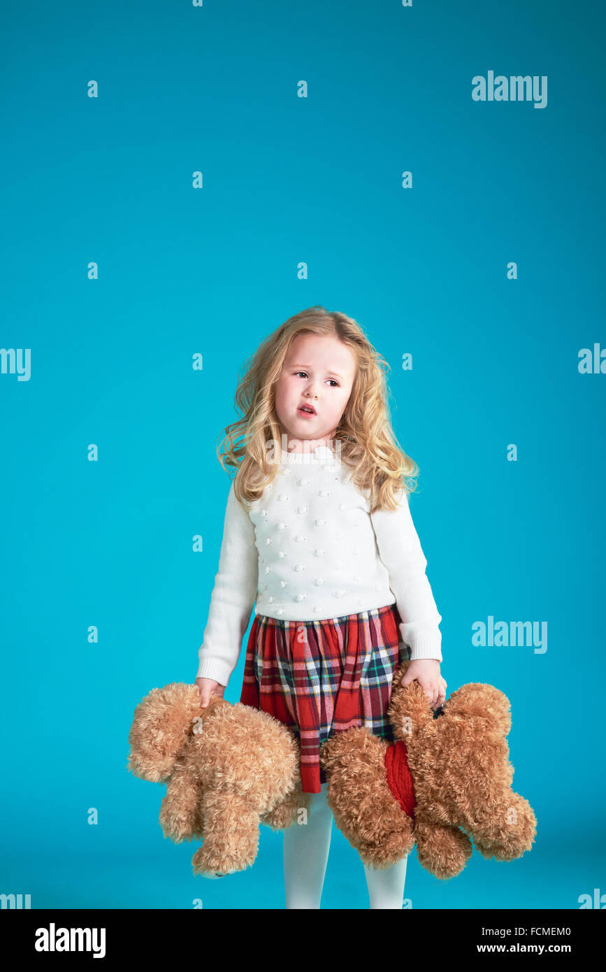 Happy girl playing with teddy bear hi-res stock photography and images ...