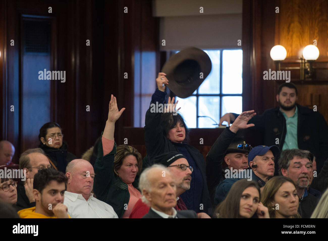 New York, NY, USA. 22nd Jan, 2016. A veteran carriage driver waves her ...