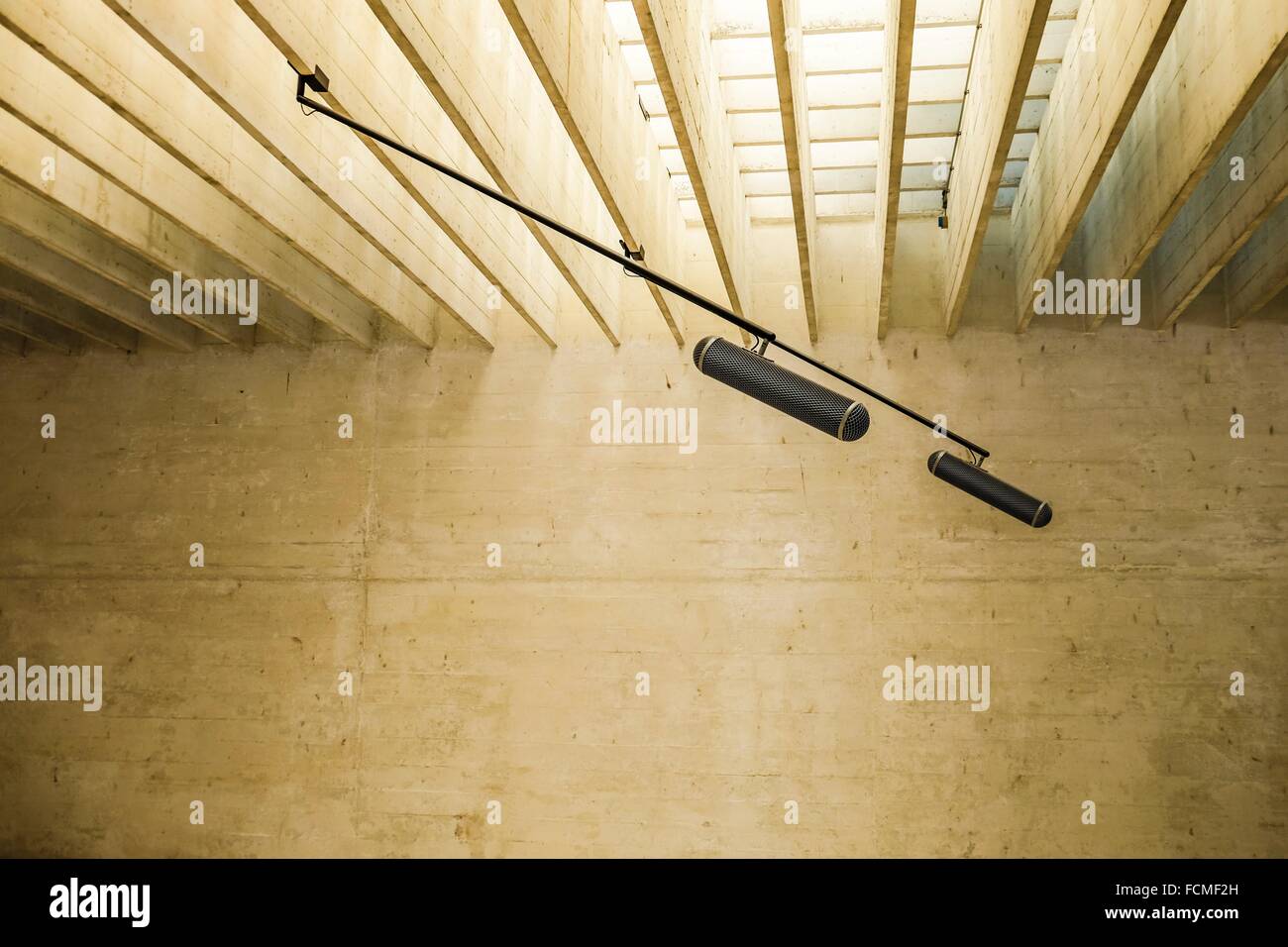 Microphones in empty space Stock Photo - Alamy