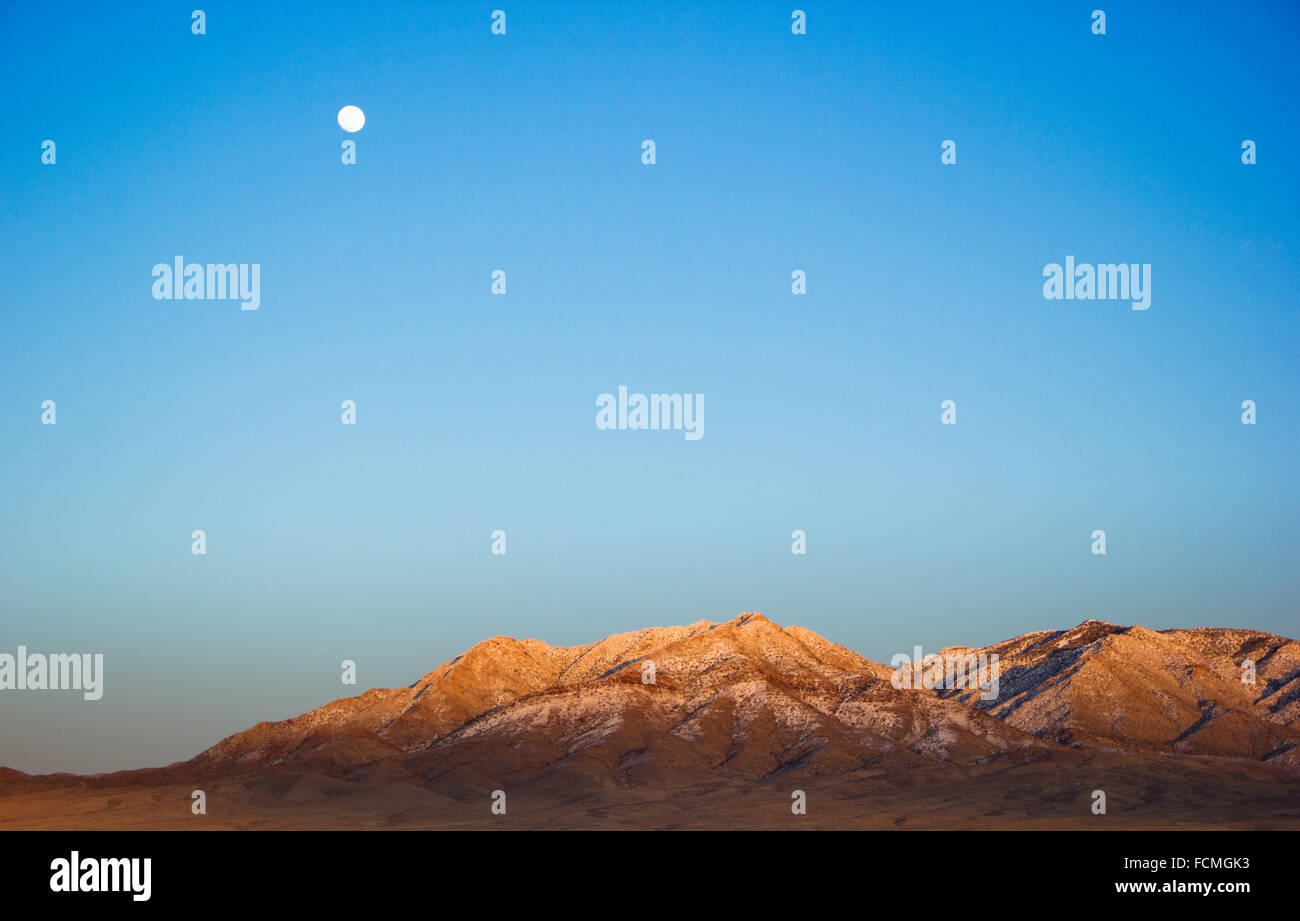 Moonrise over Nevada desert Stock Photo - Alamy
