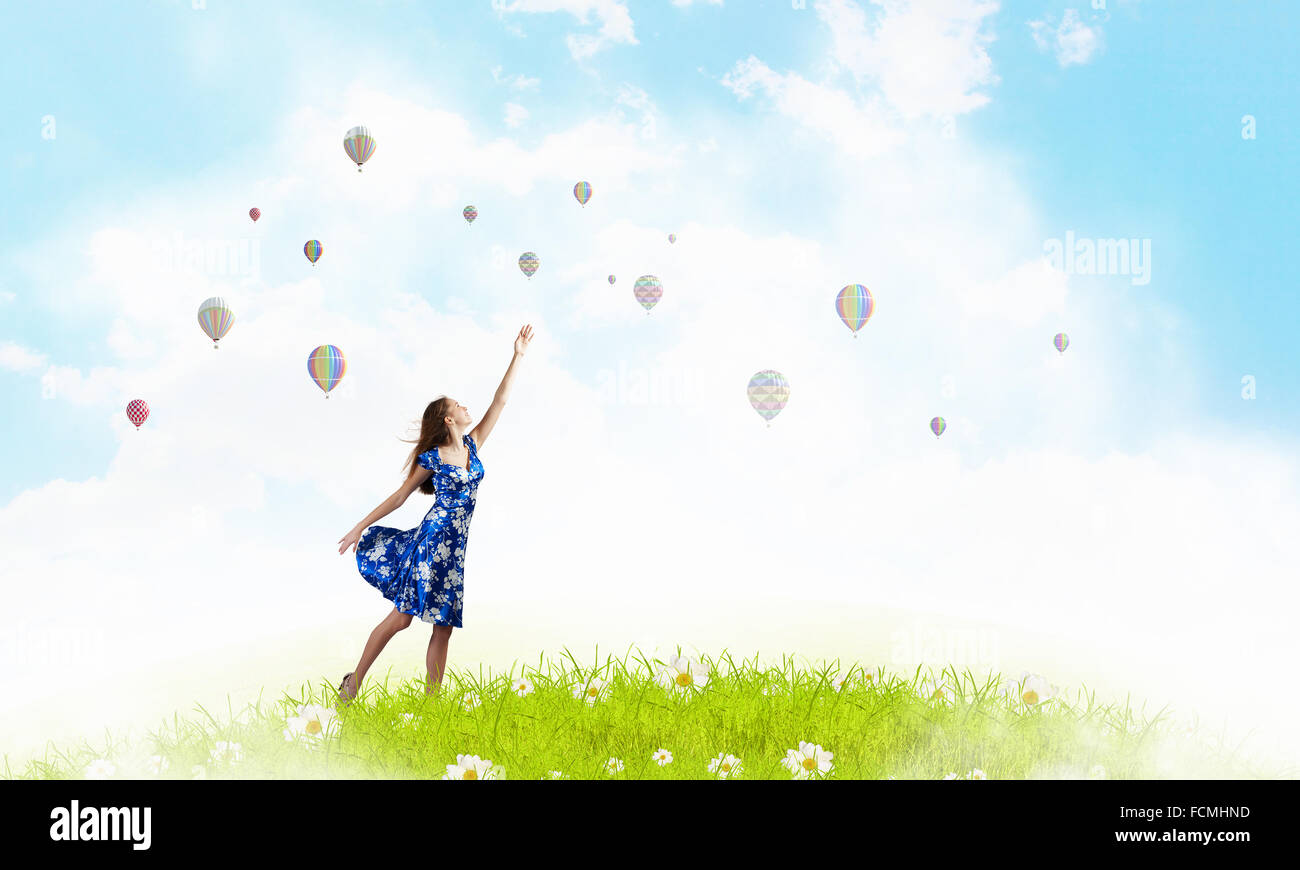 Girl Reaching Up To The Sky