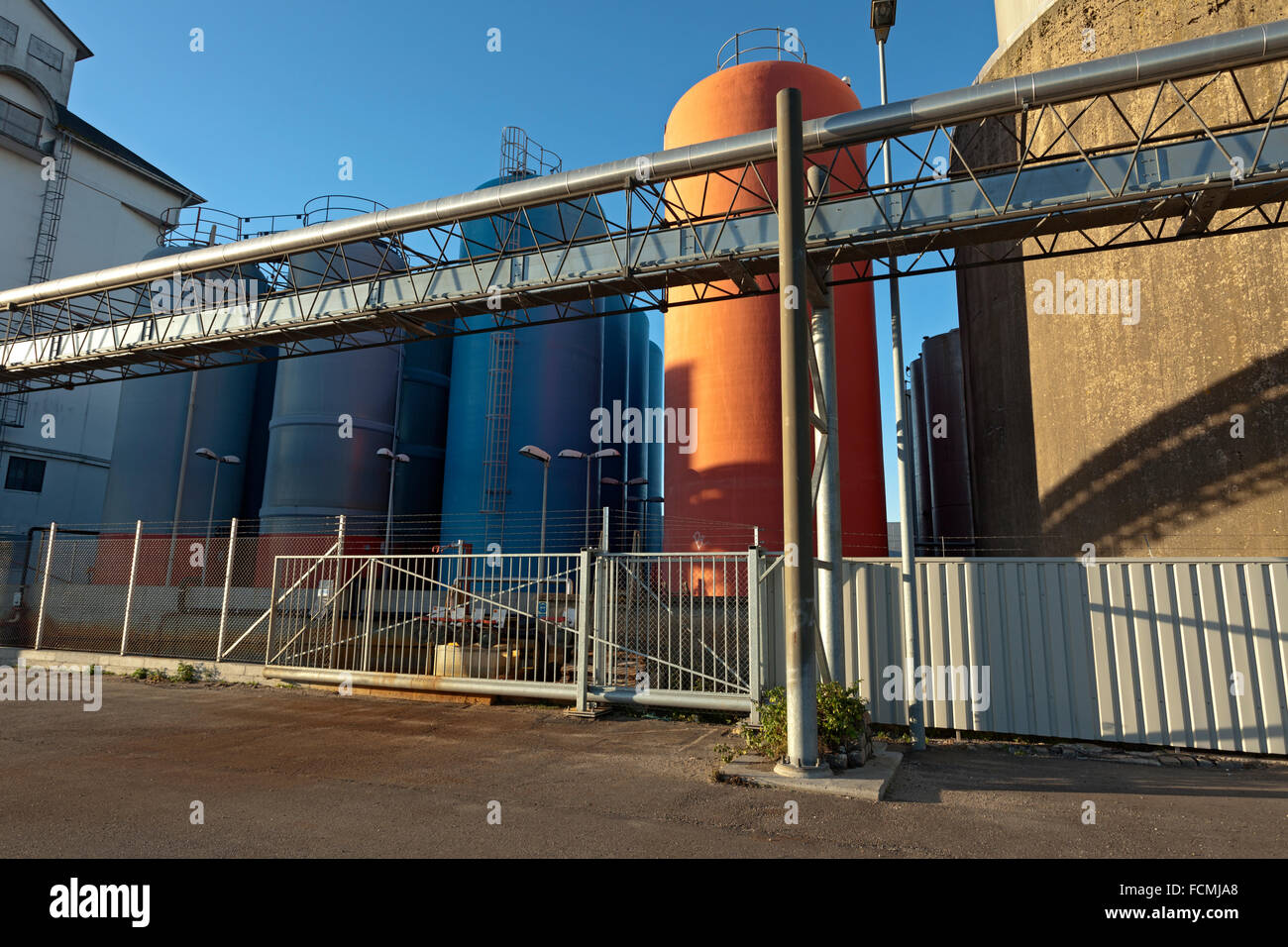 Oil tanks storing edible oils like fish oil. Colored tanks and ...