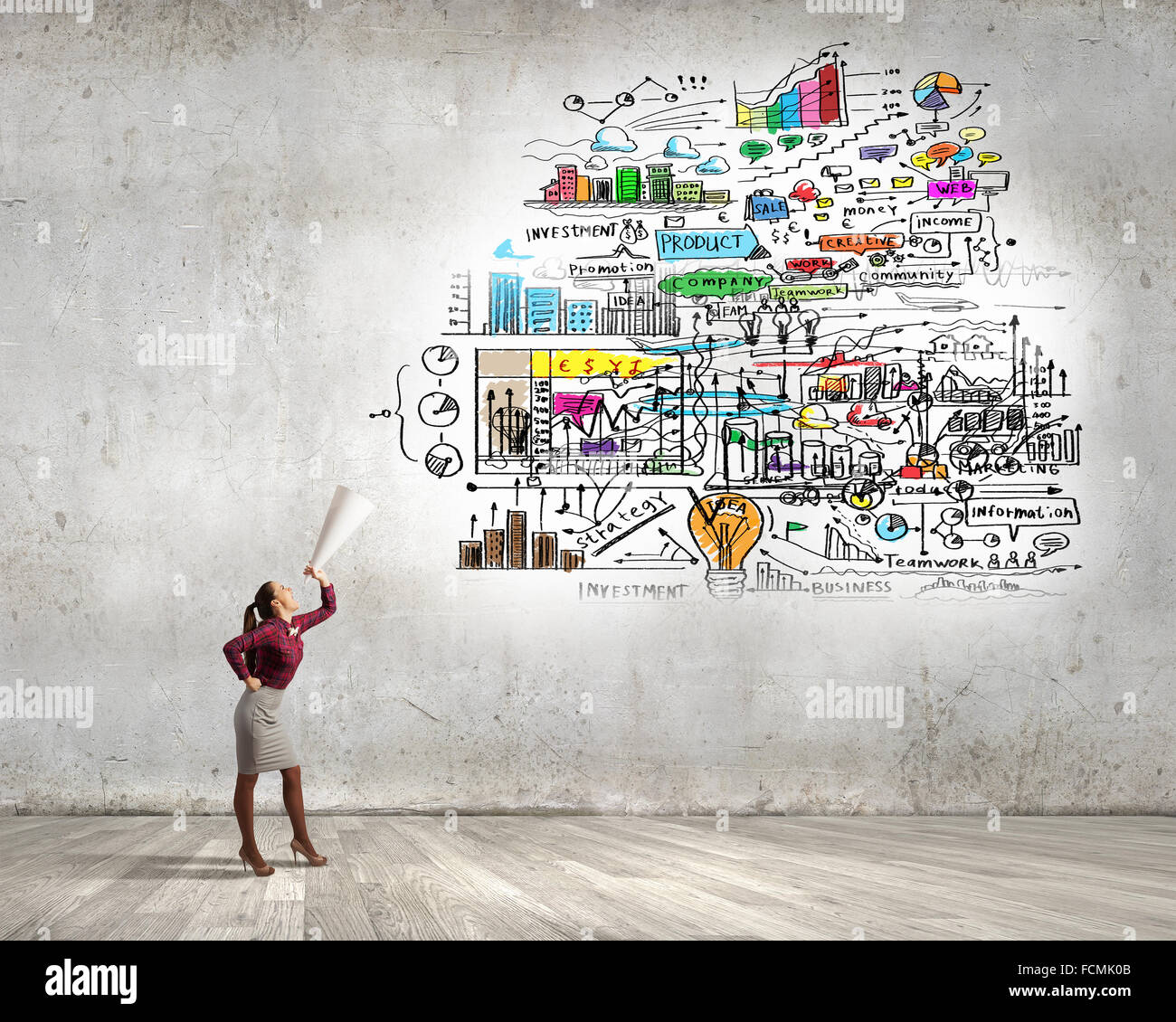 Young pretty woman screaming in paper trumpet Stock Photo - Alamy