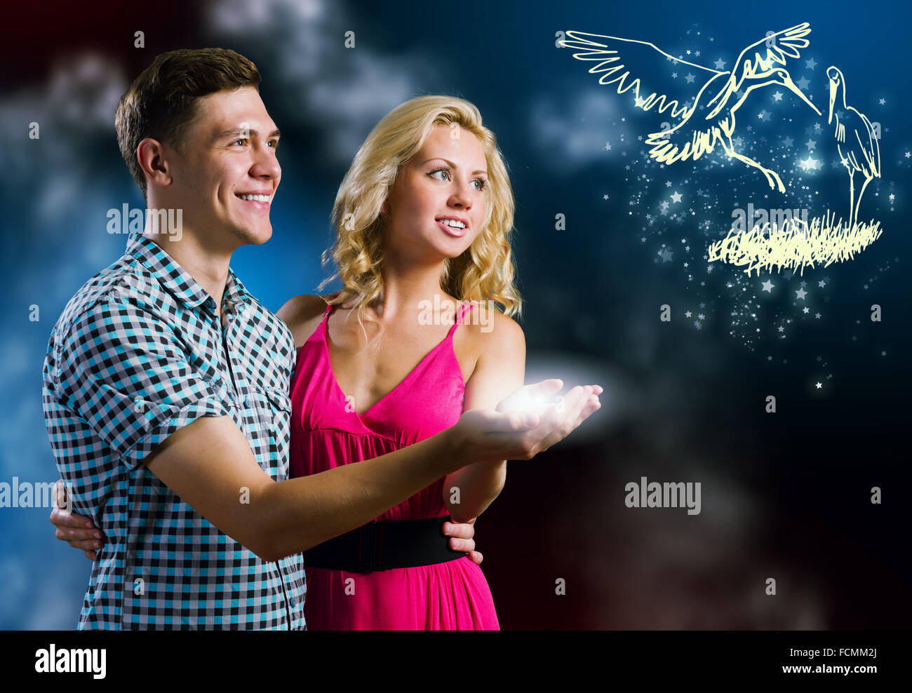 Young happy couple hugging each other and dreaming about future Stock ...