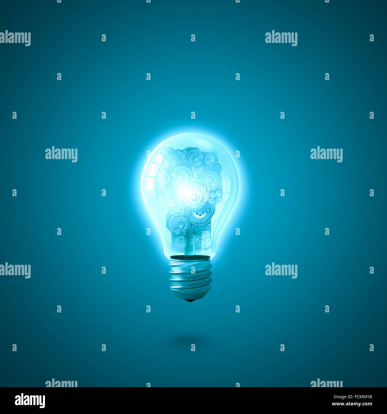 Close up of light bulb and gears mechanism Stock Photo - Alamy
