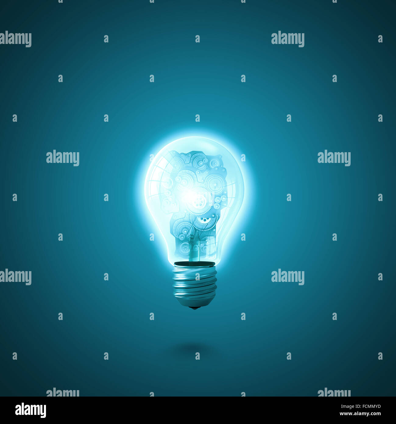 Close up of light bulb and gears mechanism Stock Photo - Alamy