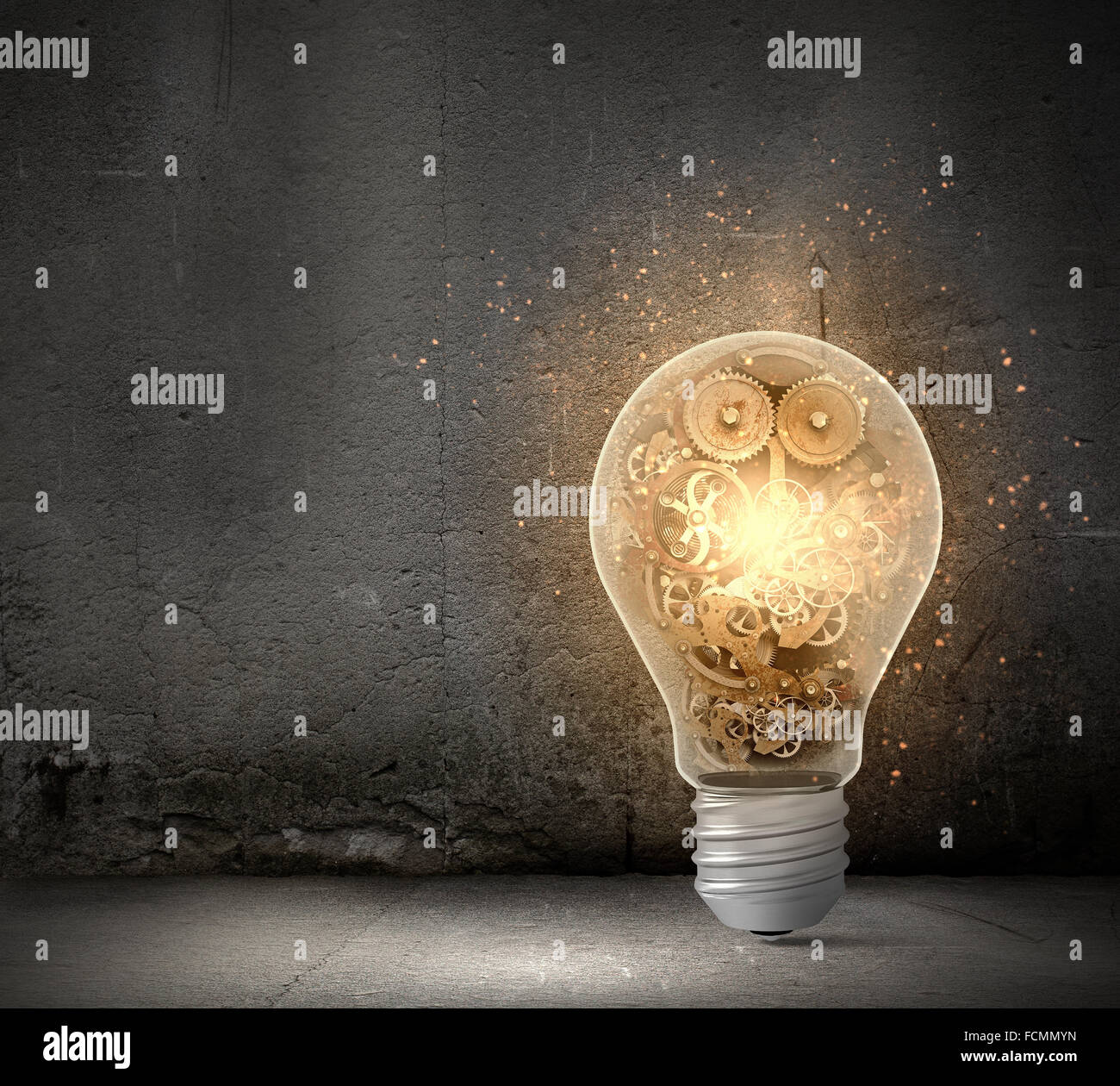 Close up of light bulb and gears mechanism Stock Photo - Alamy
