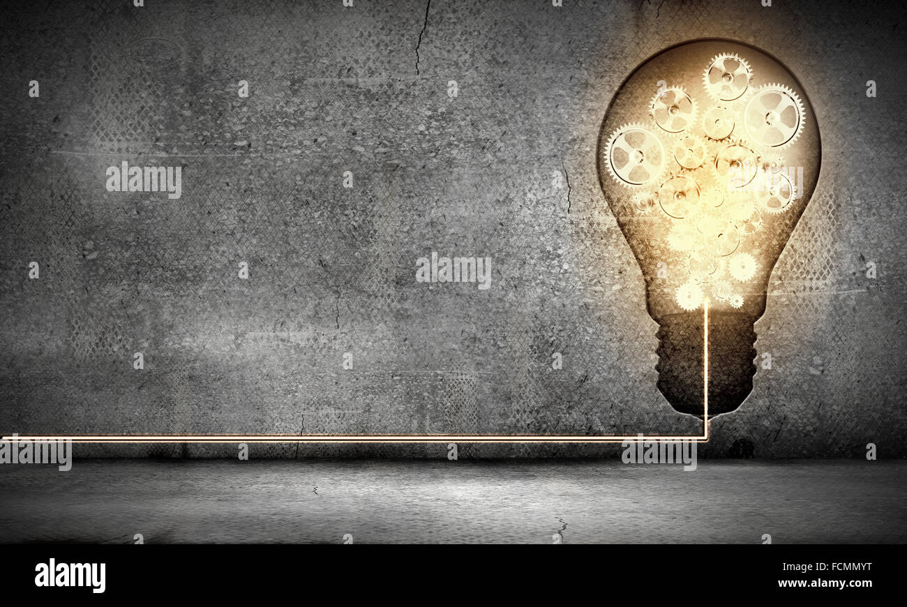 Close up of light bulb and gears mechanism Stock Photo - Alamy