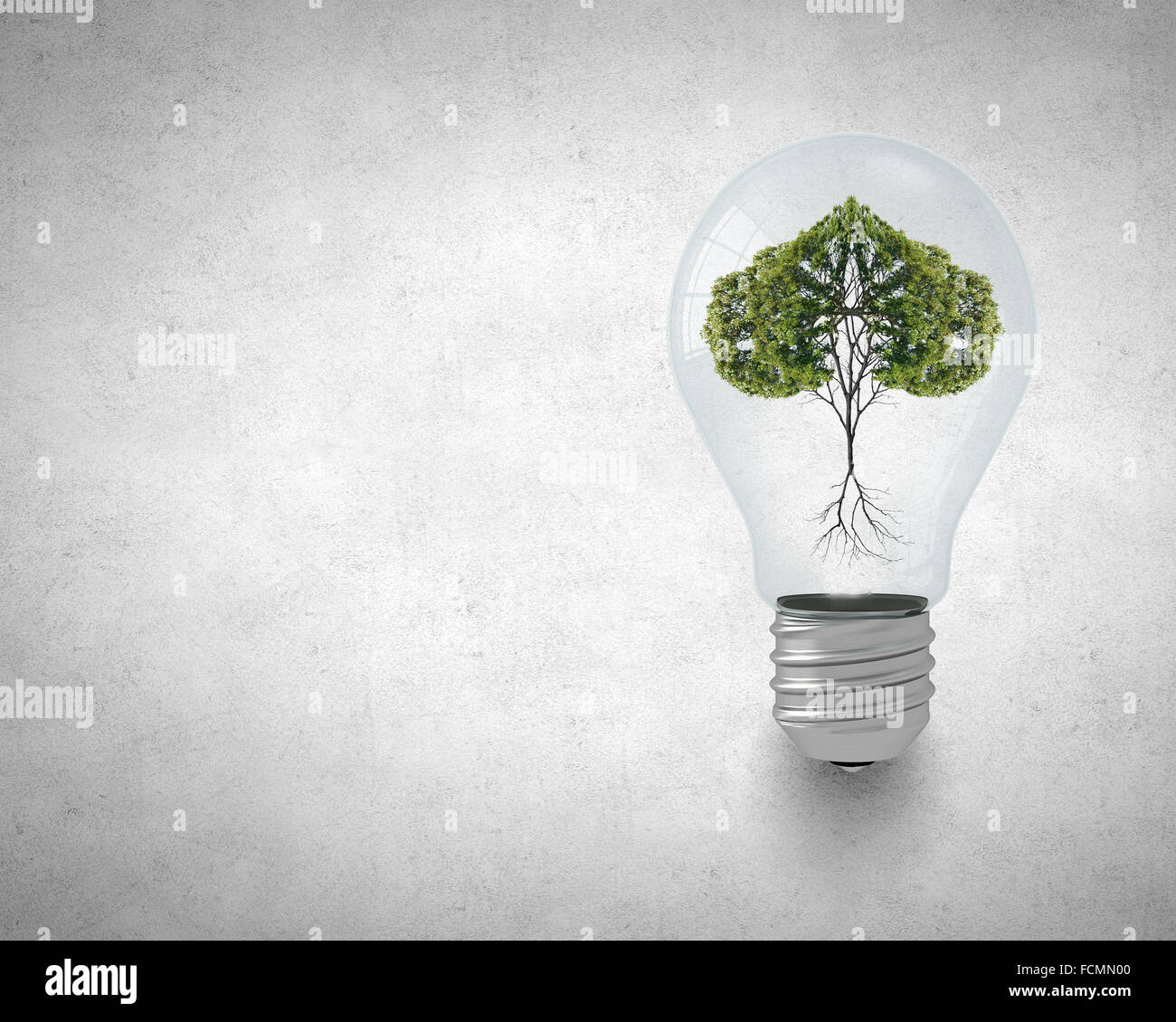 Light bulb with tree inside. Ecology concept Stock Photo - Alamy